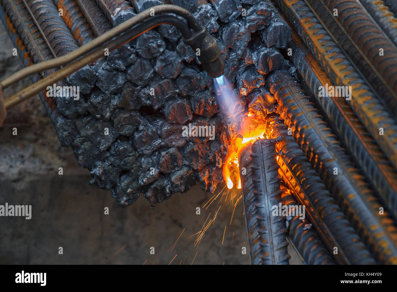 Gas cutting of metal fittings. Sparks Stock Photo - Alamy