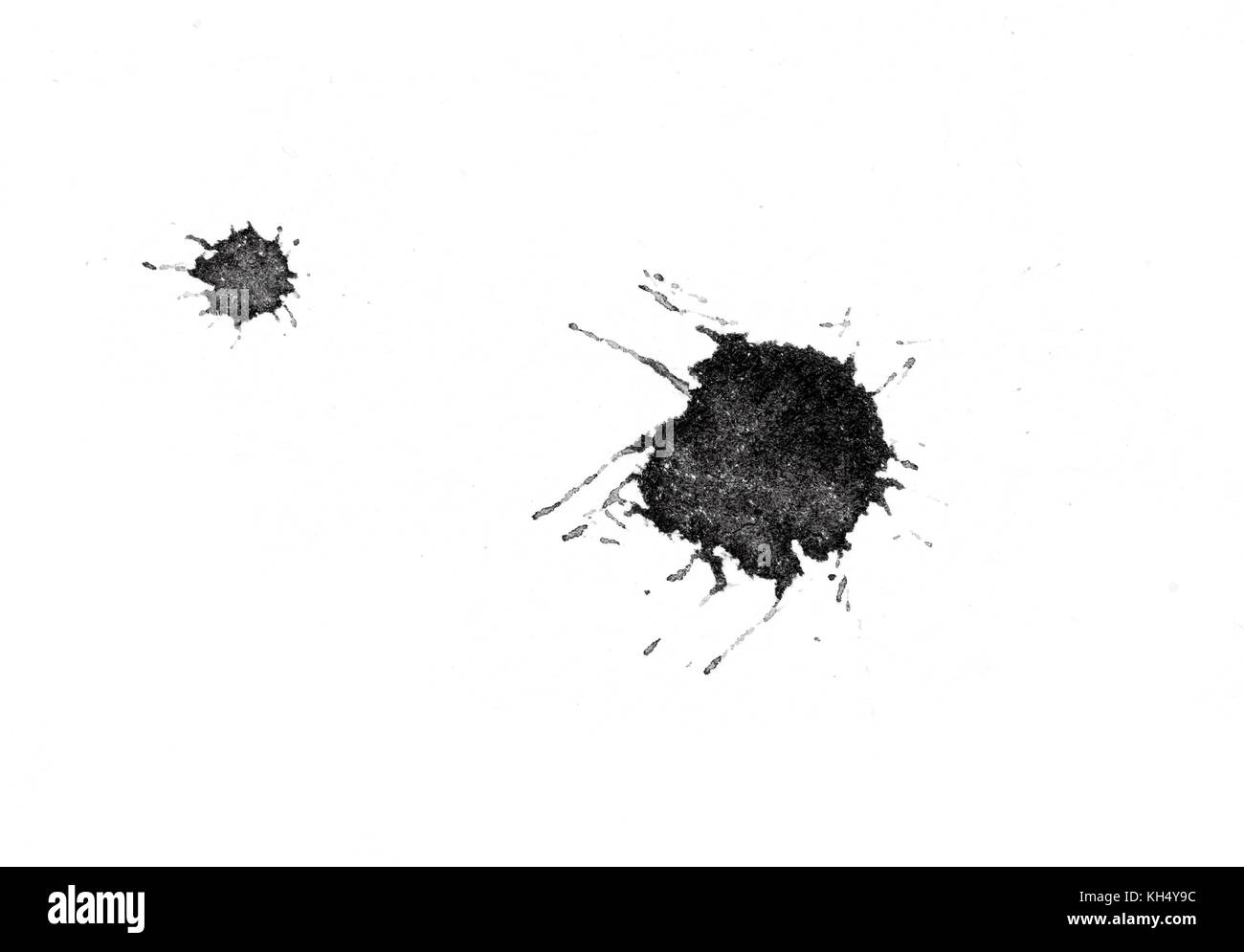 abstract black splashes on white watercolor paper. monochrome image ...