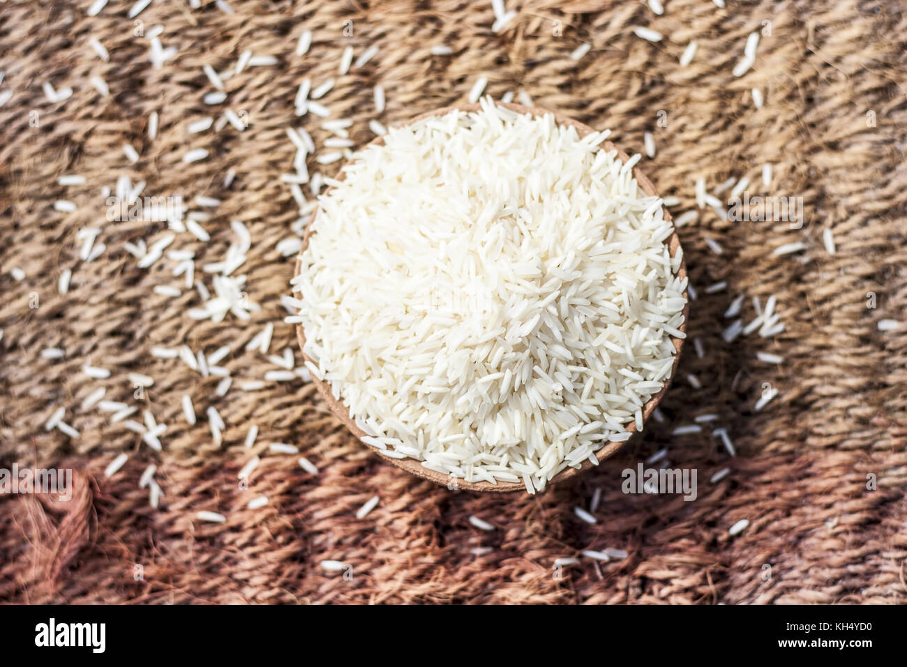 Uncooked White Basmati rice in a clay bowl Stock Photo - Alamy