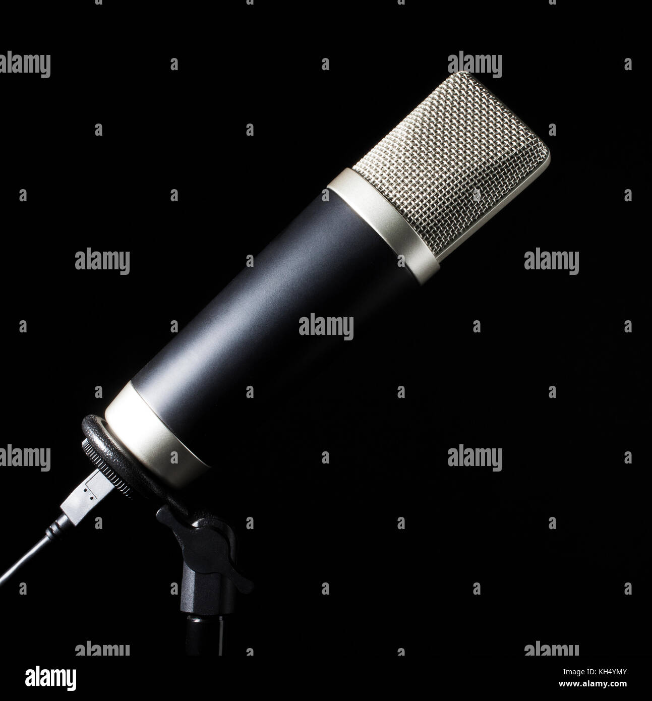 Microphone with silver metal on a dark background Stock Photo - Alamy