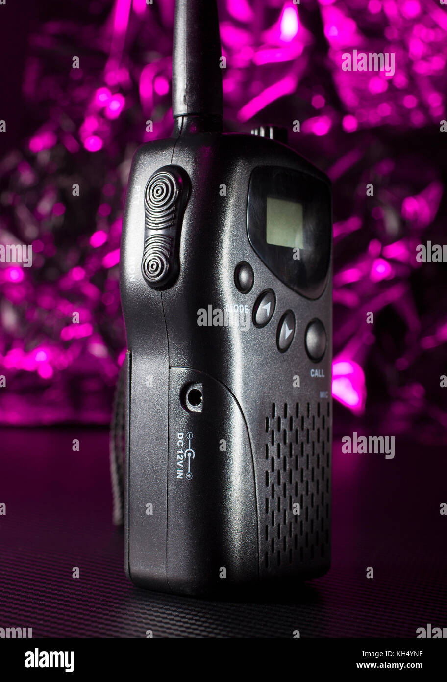 Walkie talkie that is used on multi user radio system with purple ...