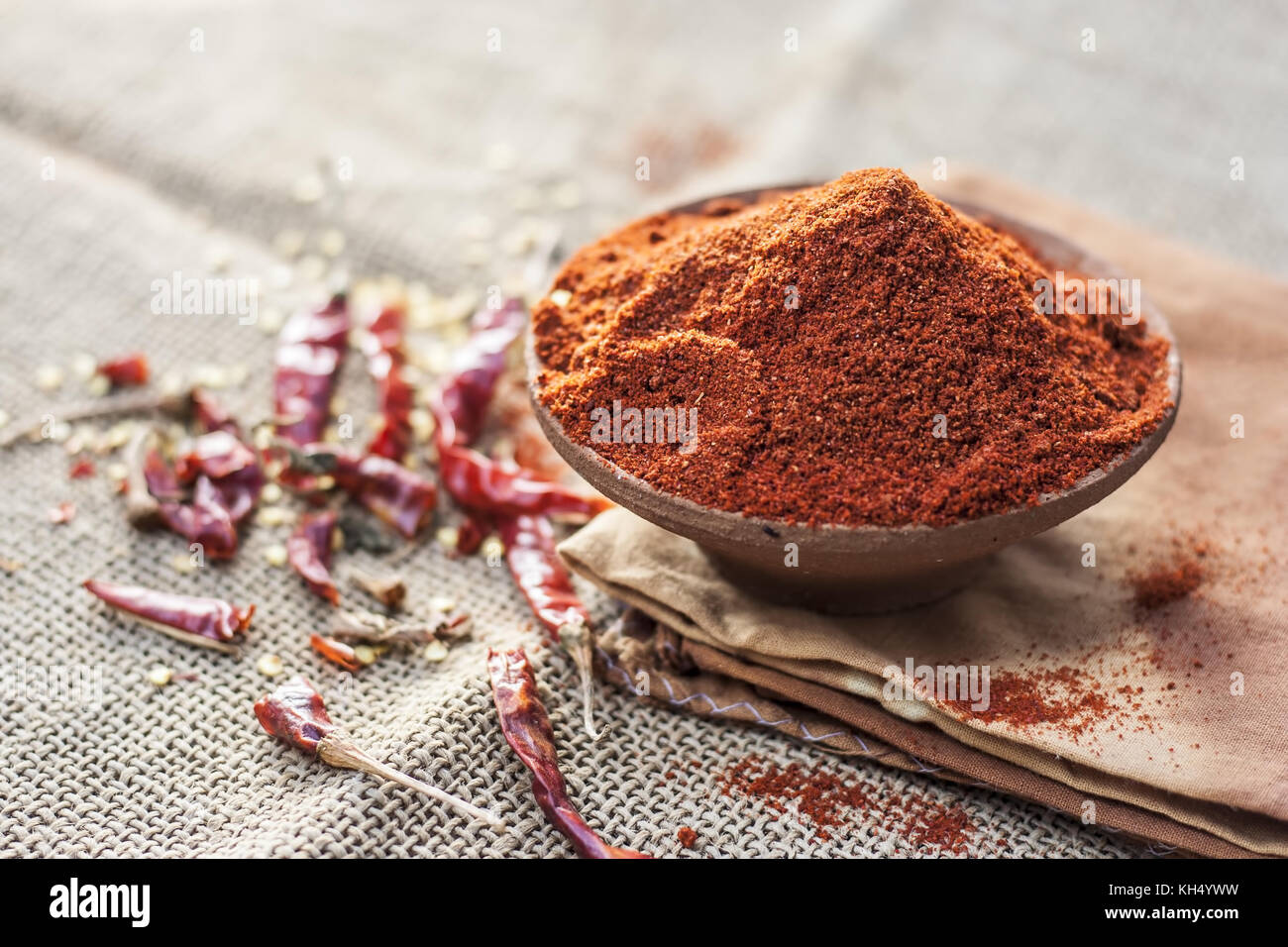 Red chili powder in a clay bowl Stock Photo - Alamy