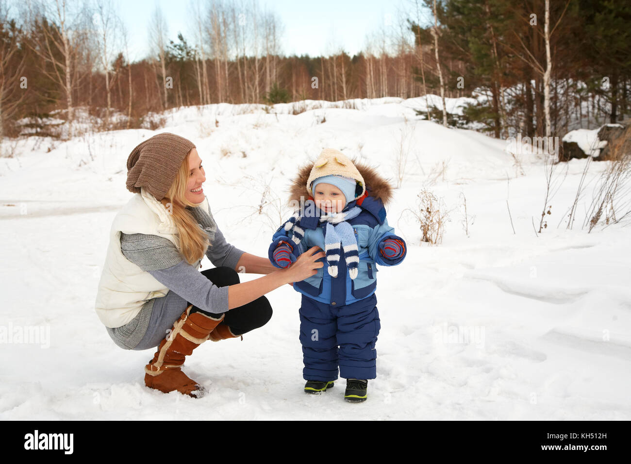 mother and baby in winter Stock Photo - Alamy