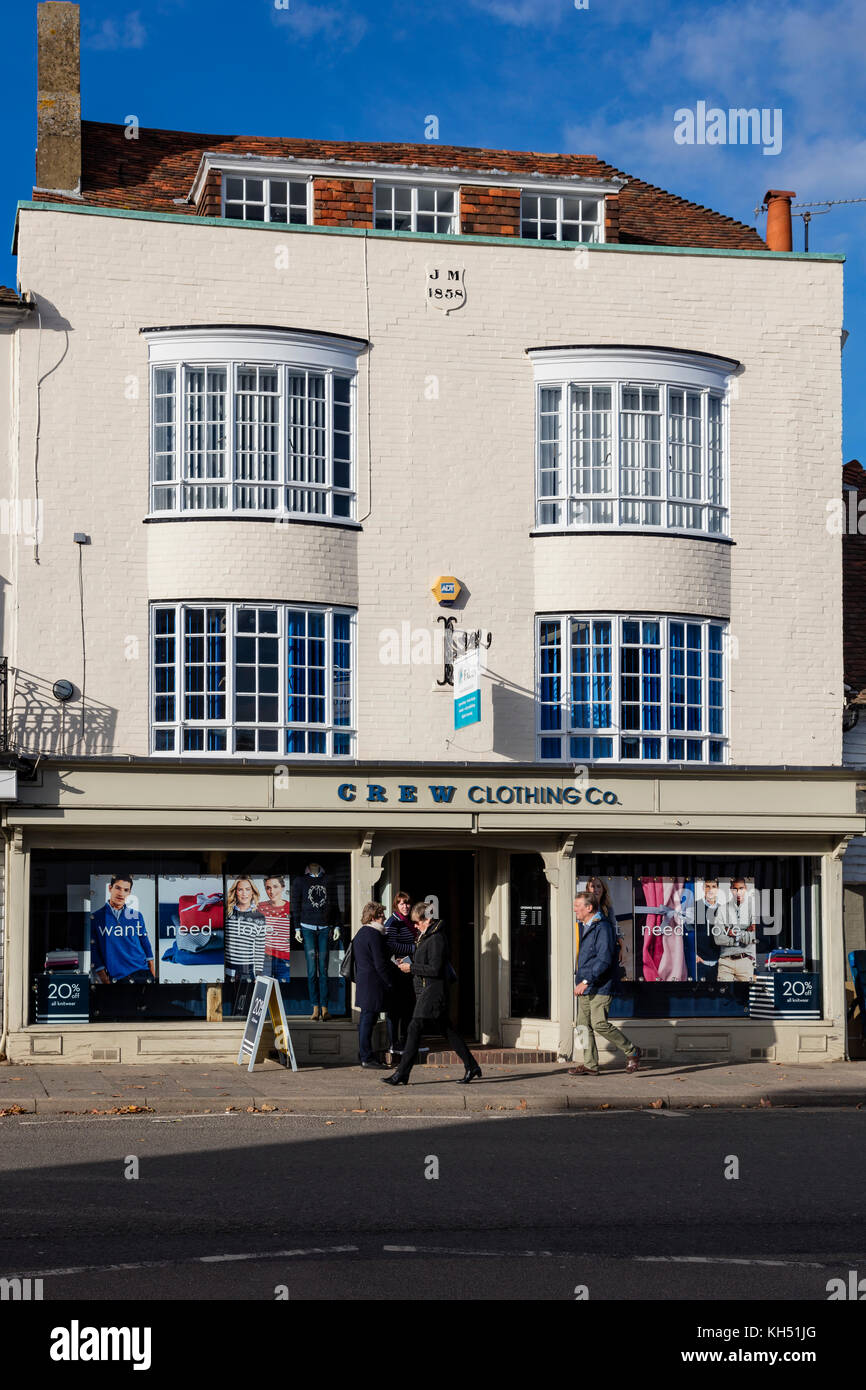 Santander Bank and Crew Clothing shop in traditional old buildings on ...