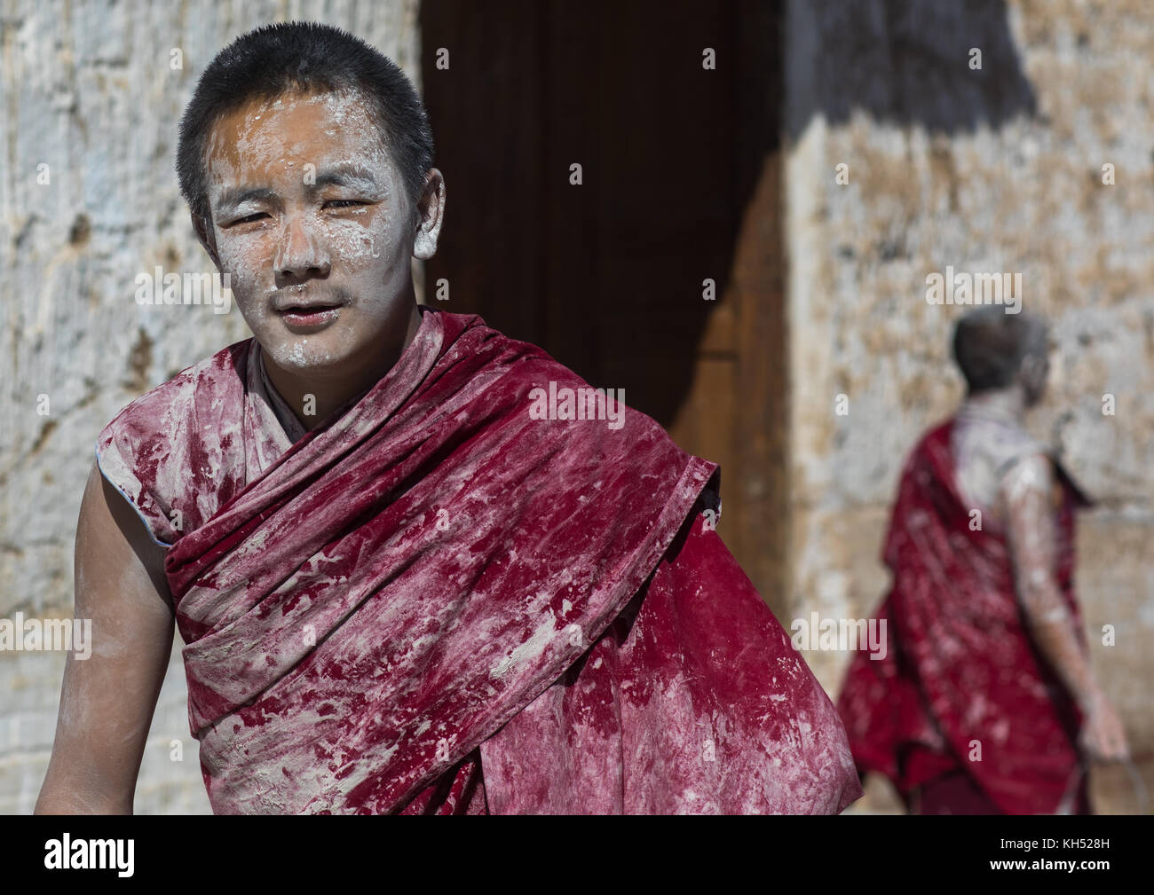 Tibetan monks enjoying a water fight after the yearly renovation of the ...