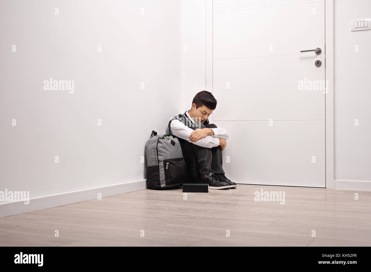 Sad teenager boy worried inside hi-res stock photography and images - Alamy