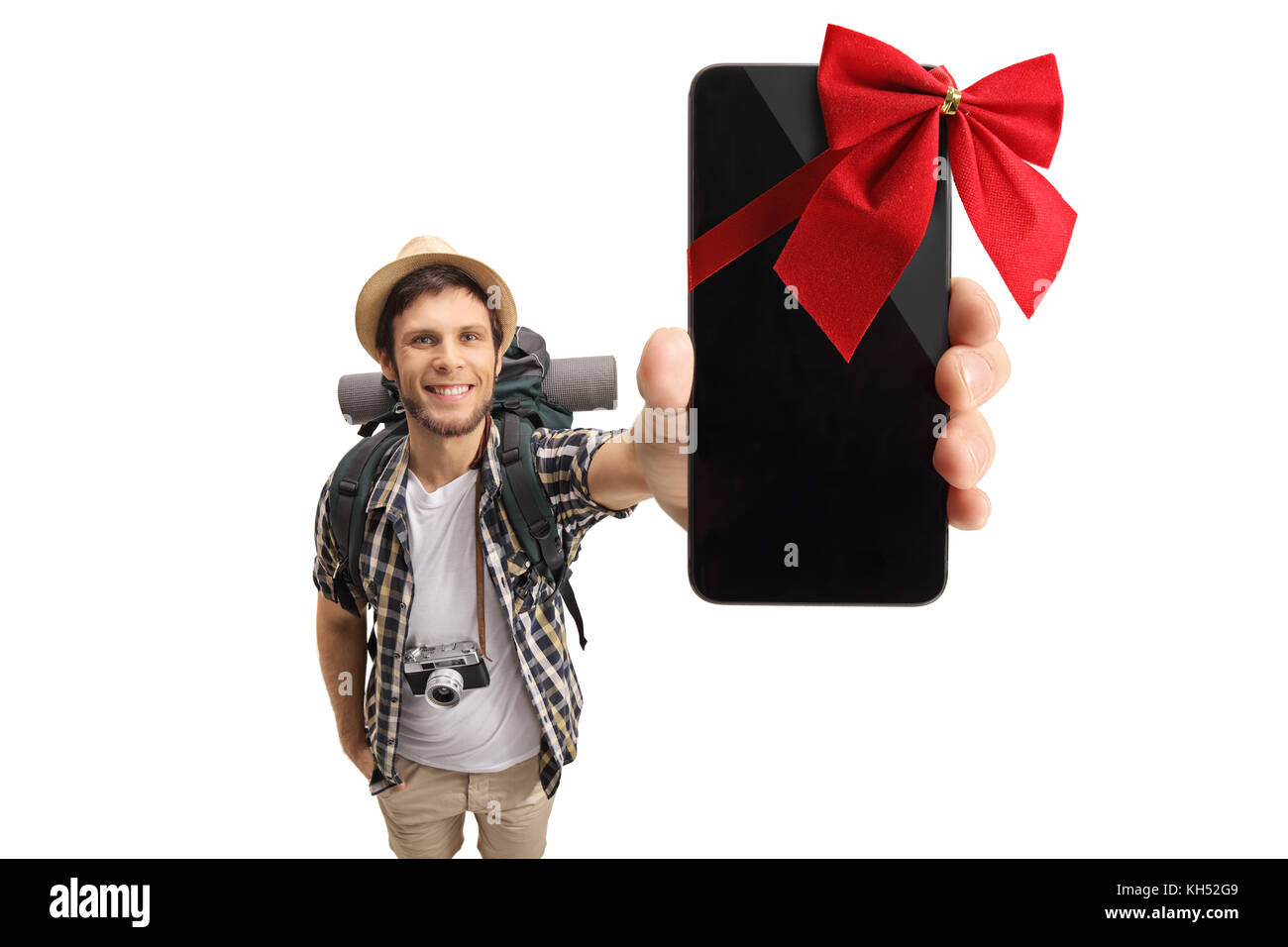 Tourist showing a phone wrapped with red ribbon as a gift isolated on ...