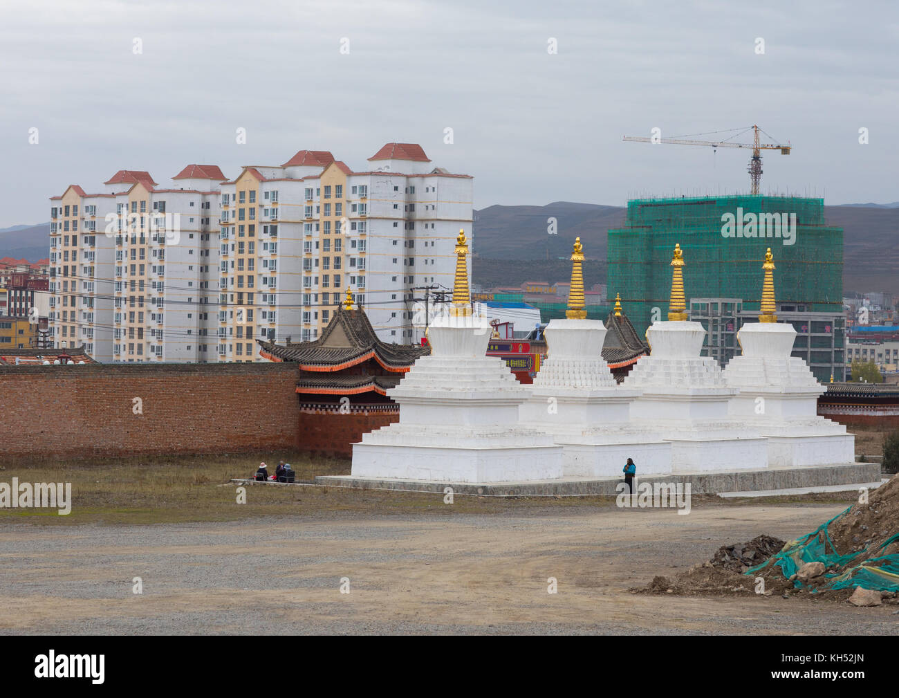 Stupas in front of the modern town in Hezuo monastery, Gansu province ...