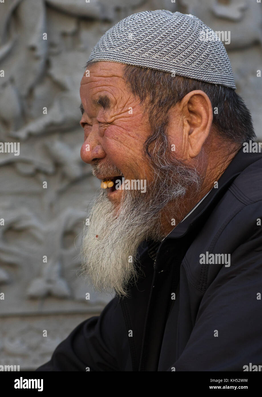 Smiling hui muslim man in the street , Gansu province, Linxia, China ...