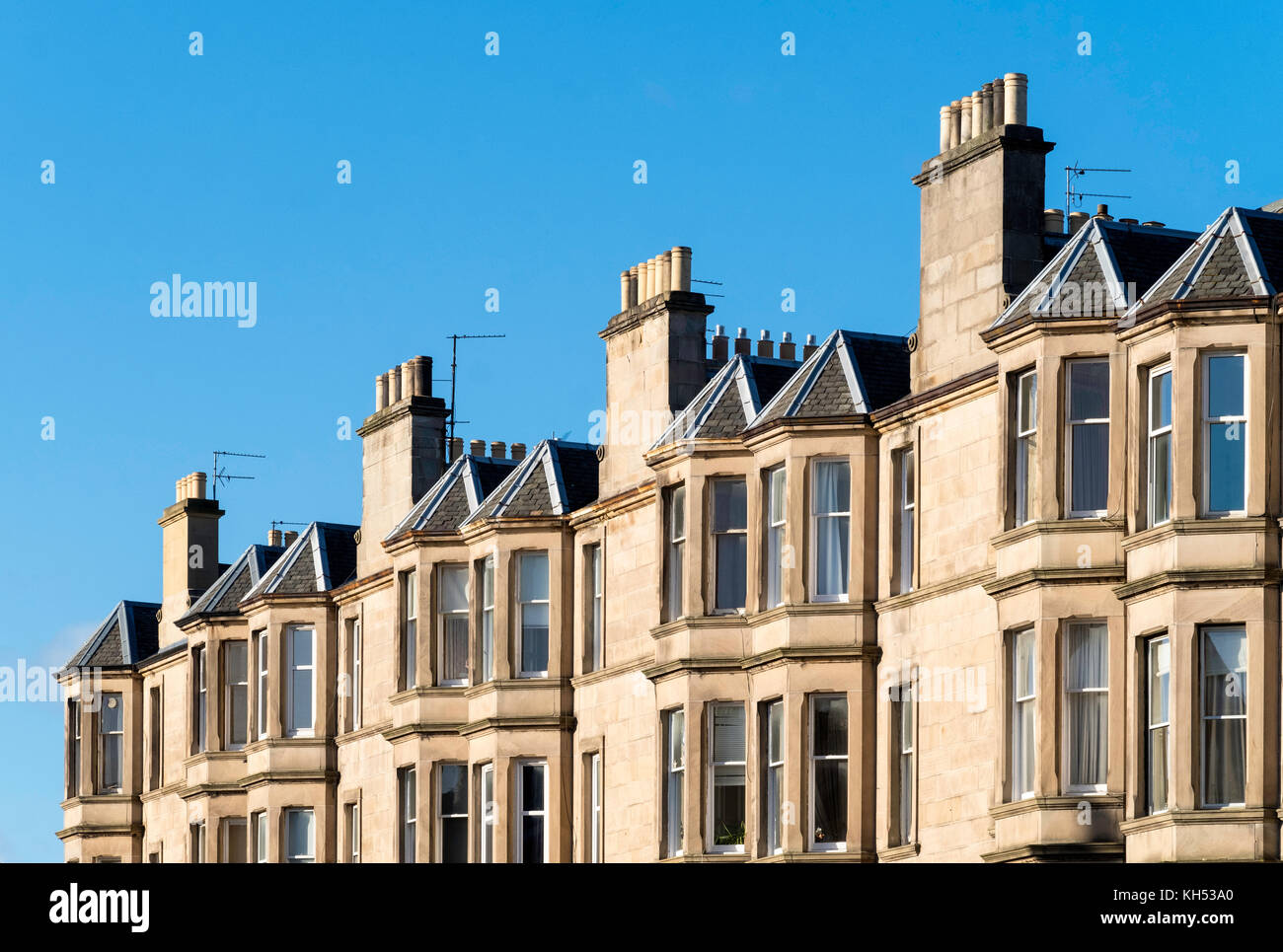 View of row of sandstone terraced apartments (tenements) on Comely Bank ...