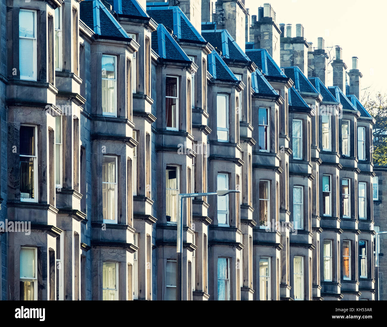 Detail of row of sandstone terraced apartments (tenements) on Comely ...