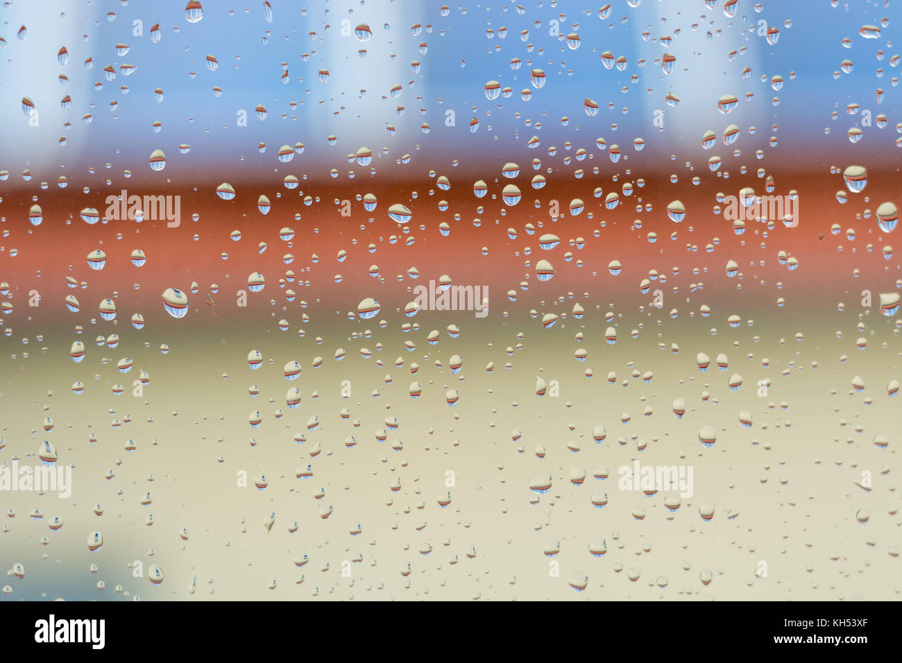 Rain drops on window as a close up Stock Photo - Alamy