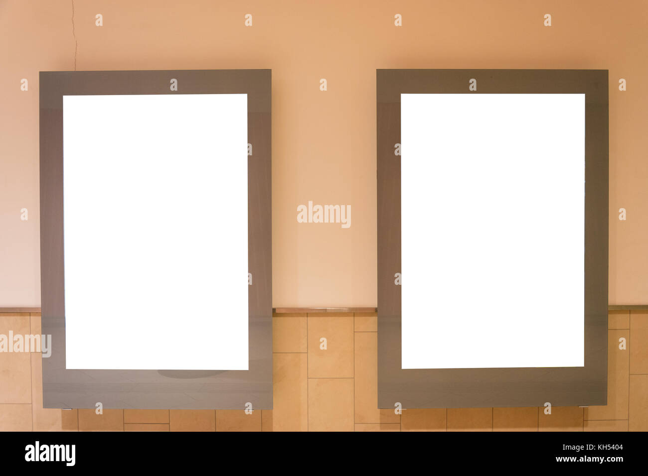 Two blank ad space signs isolated in a mall from the front Stock Photo ...