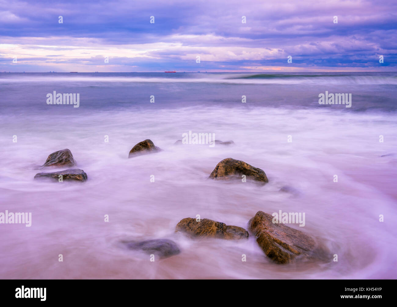 Moody day on the beach. Long exposure background Stock Photo - Alamy