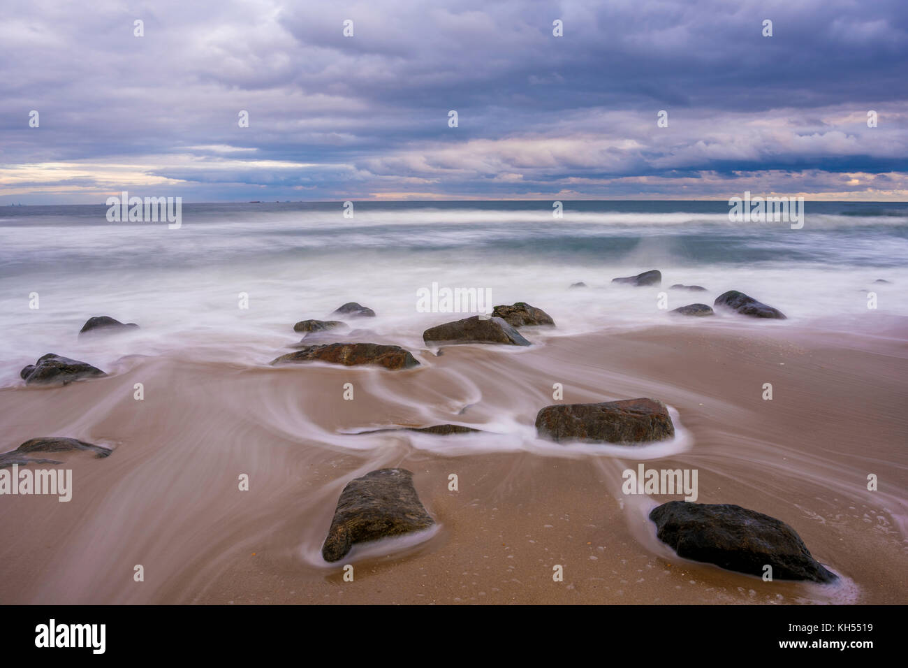Moody day on the beach. Long exposure background Stock Photo - Alamy