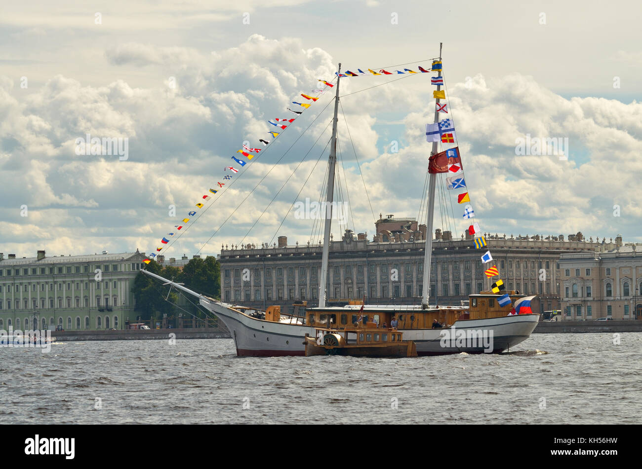 Marine boat lowered sail and dropped anchor Stock Photo - Alamy