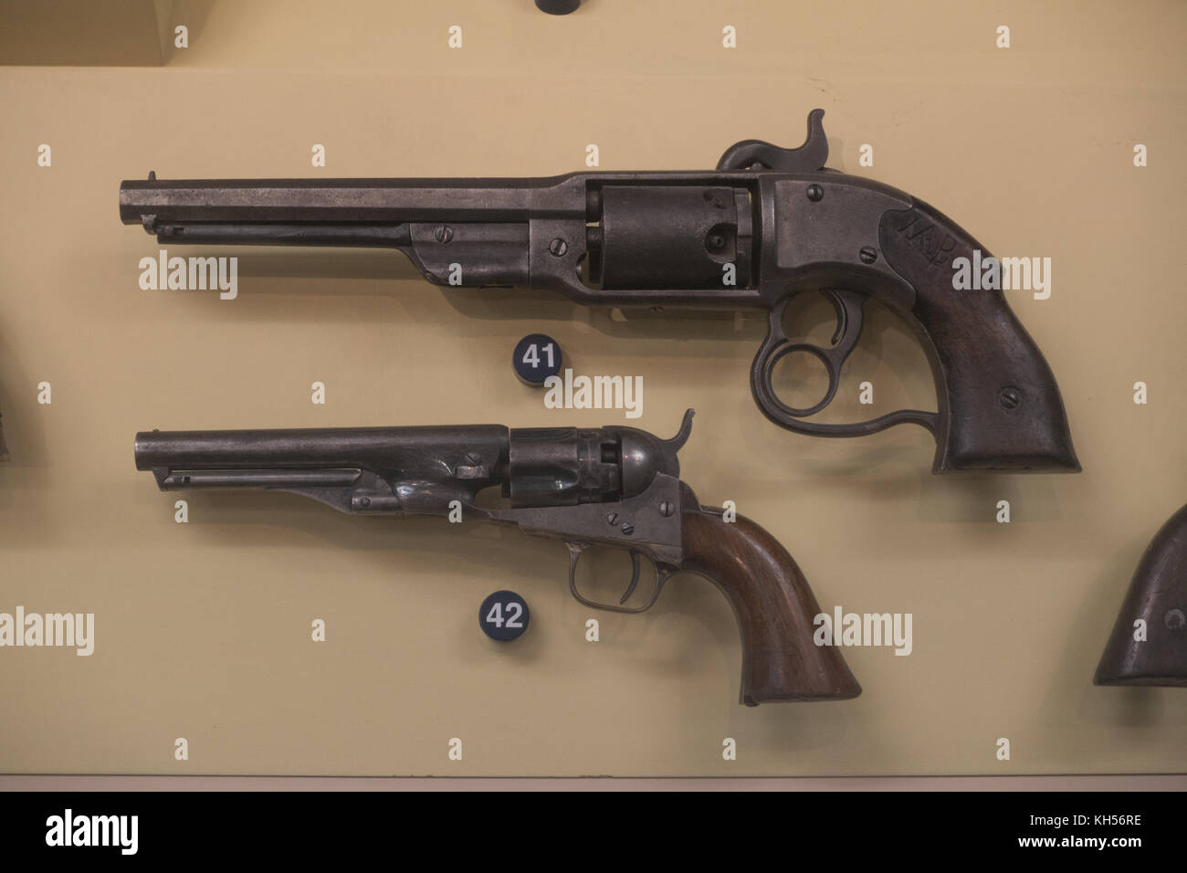 A Salvage revolver 1859 (41) and a Colt Revolver 1862 (42), National ...