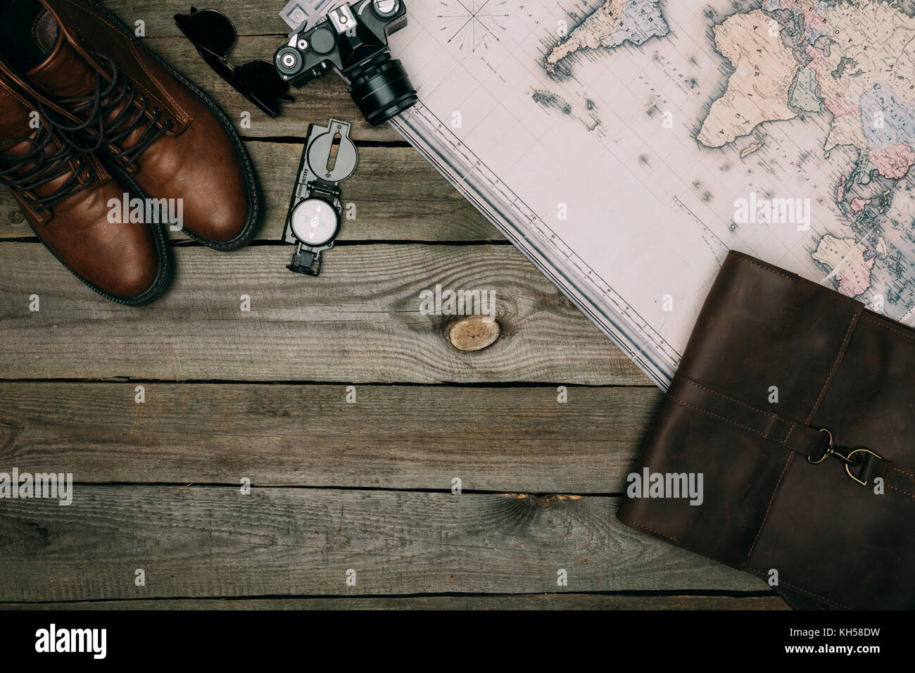 map with film camera and compass with shoes Stock Photo - Alamy