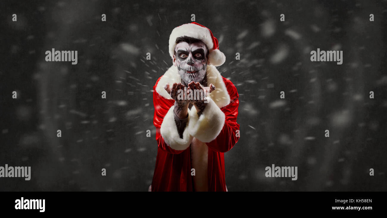 Santa Claus is a wizard with a skull on Christmas Stock Photo - Alamy
