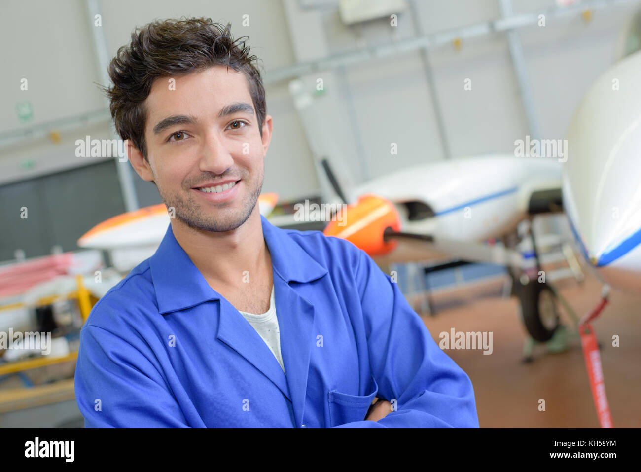 aircraft laborer posing Stock Photo - Alamy
