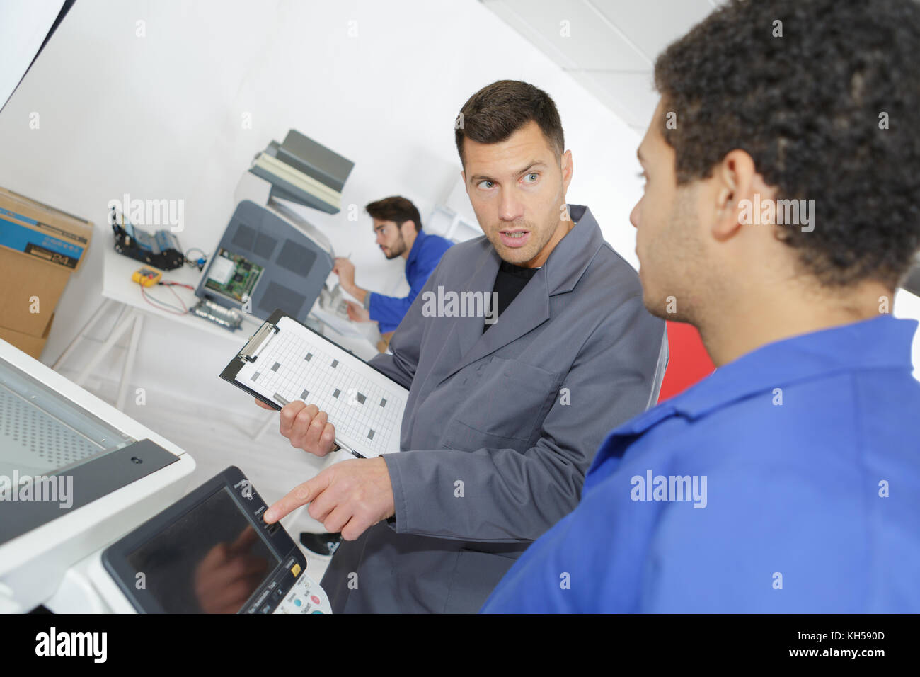 Office machine repairer hi-res stock photography and images - Alamy