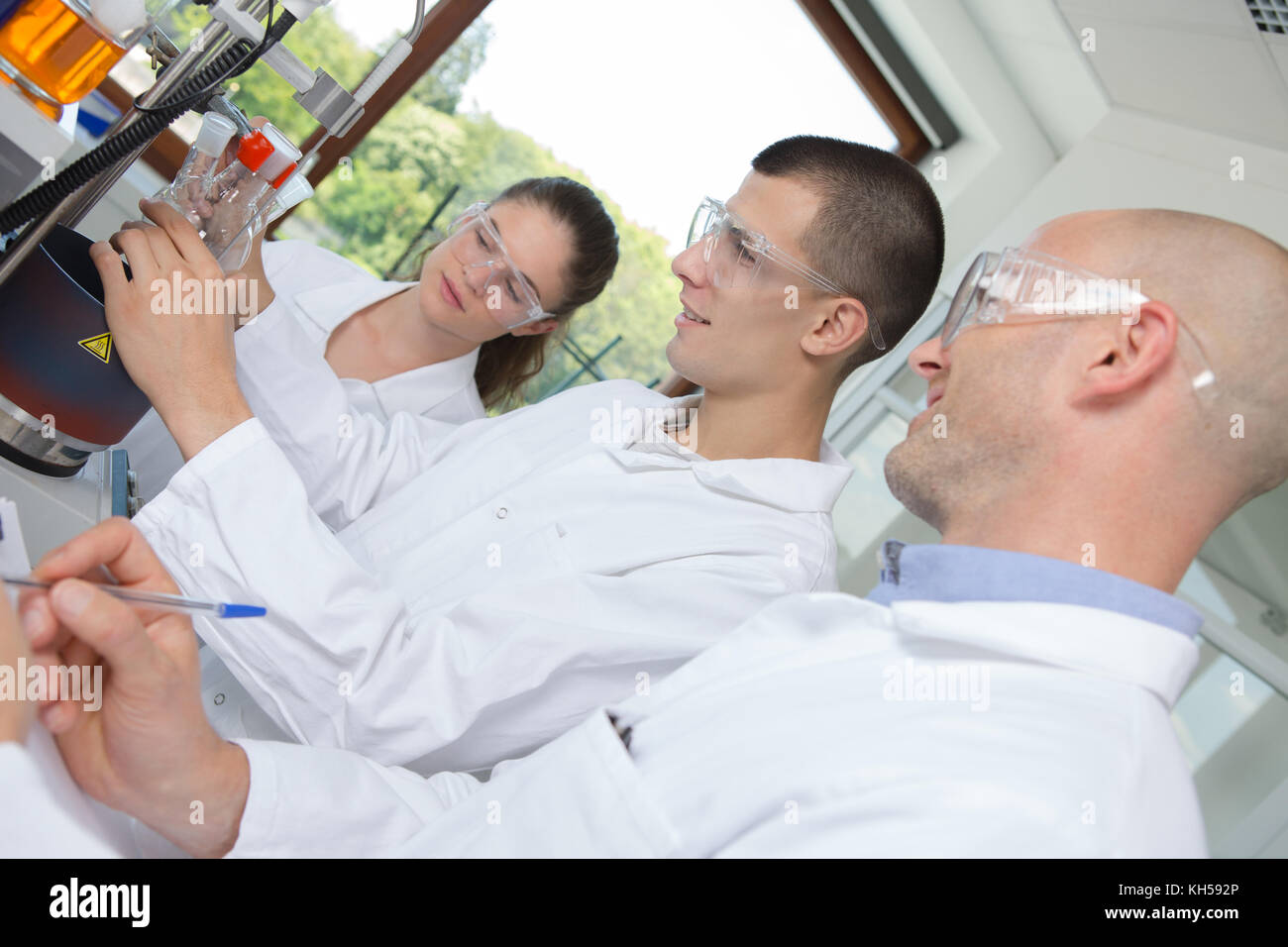 students with teacher during chemistry class at the university Stock ...