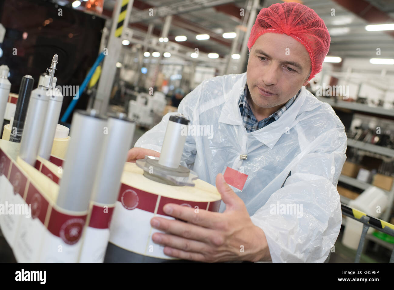 man setting up the machine Stock Photo - Alamy
