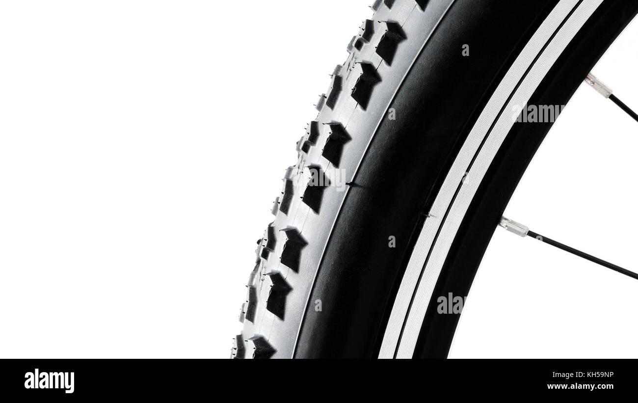 Detail of bicycle wheel, tire and spoke, close up with black chrome ...