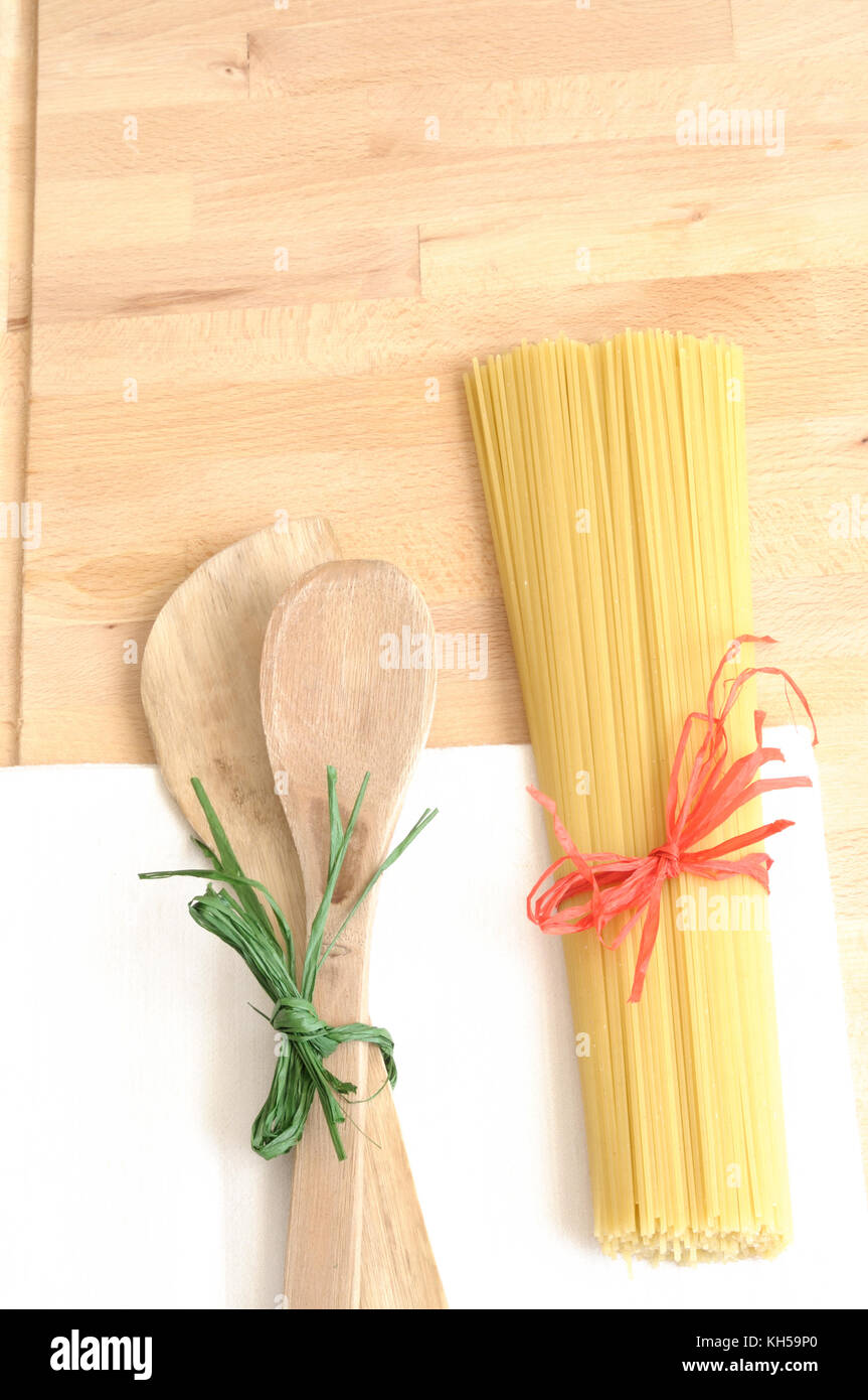 Spaghetti over a white cloth in the kitchen Stock Photo - Alamy
