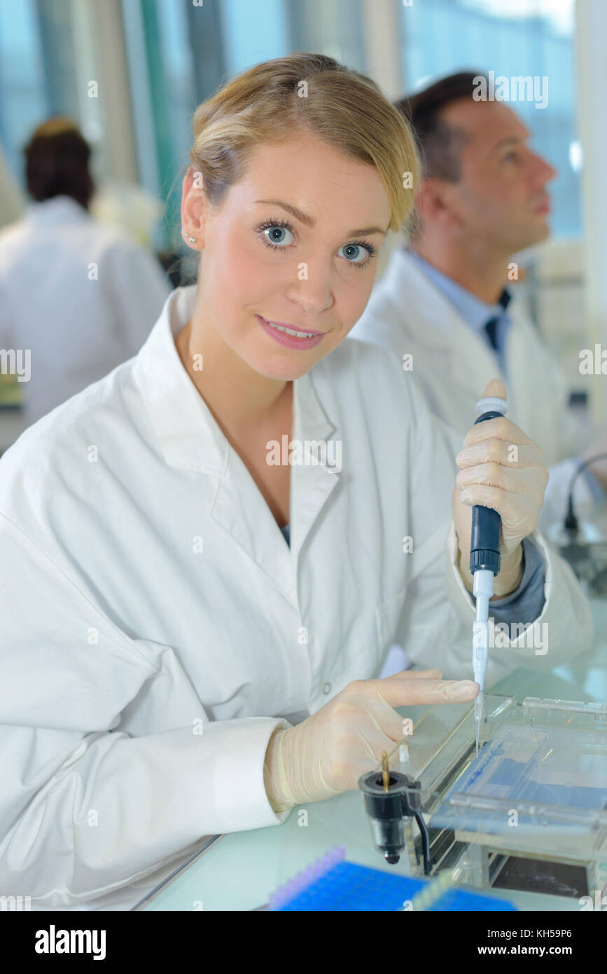 scientist performing analysis Stock Photo - Alamy