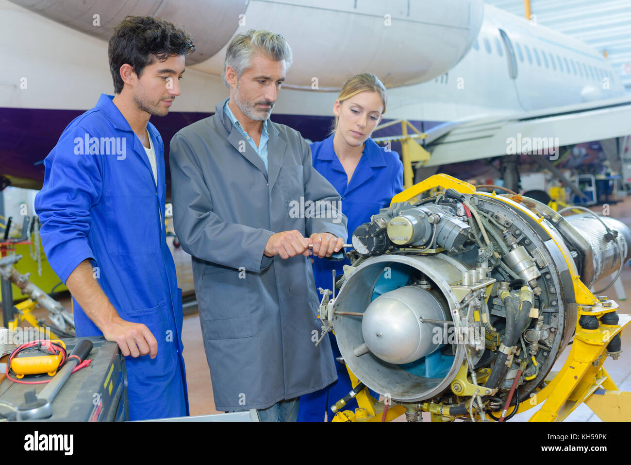 Students looking at aircraft turbine Stock Photo - Alamy