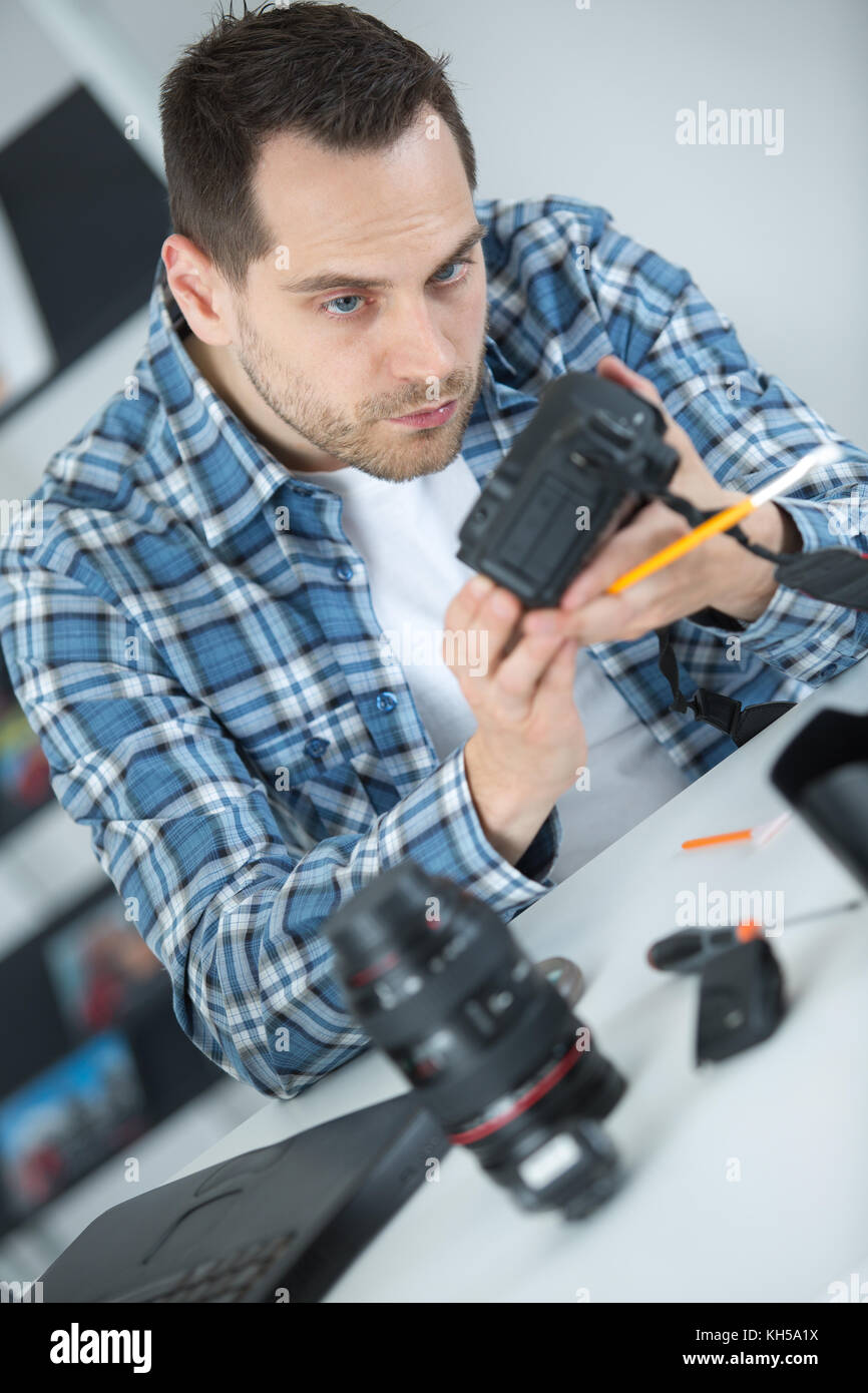 photographing equipment maintenance and repair Stock Photo - Alamy