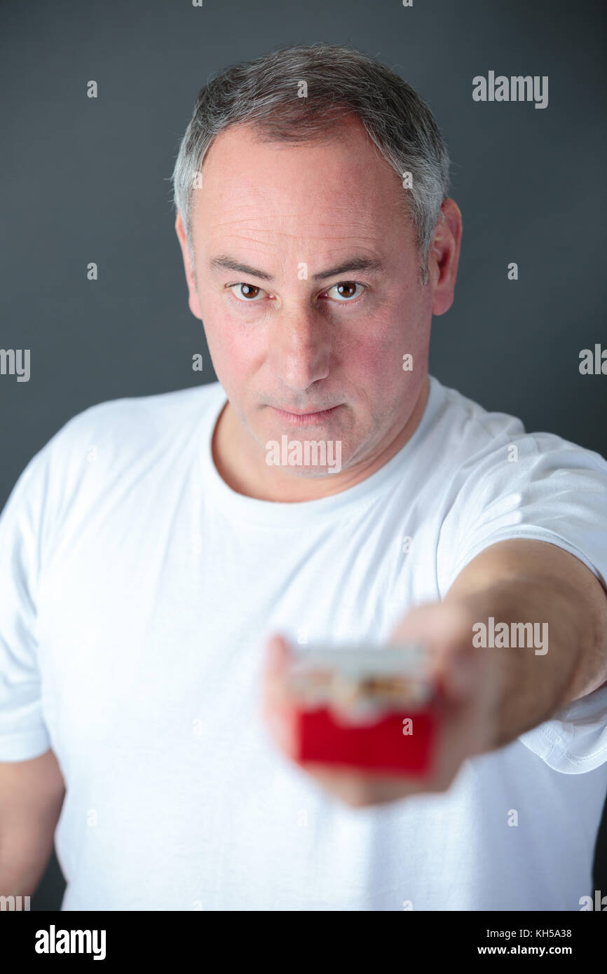 man offering a cigarette Stock Photo - Alamy