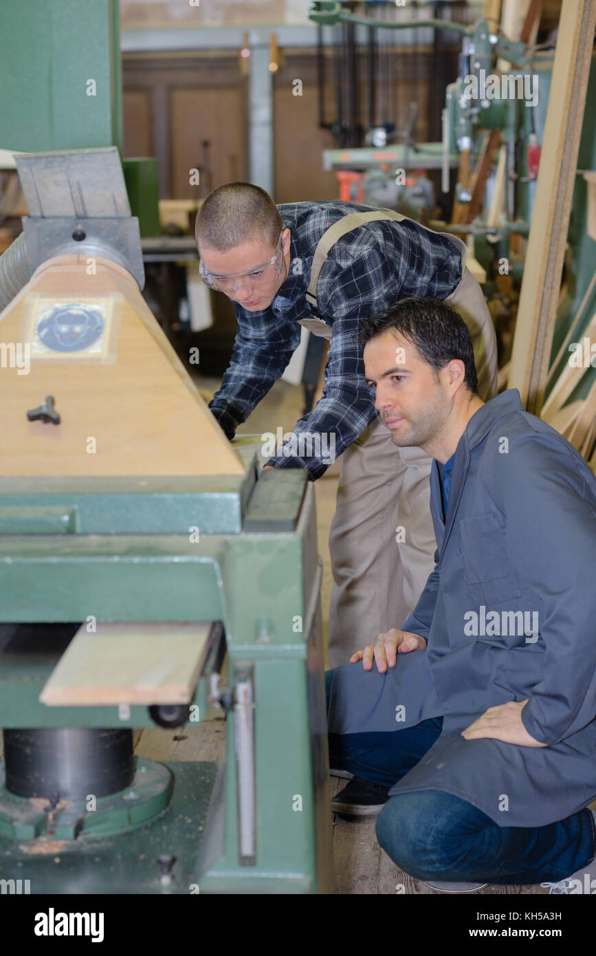 worker with apprentice Stock Photo - Alamy