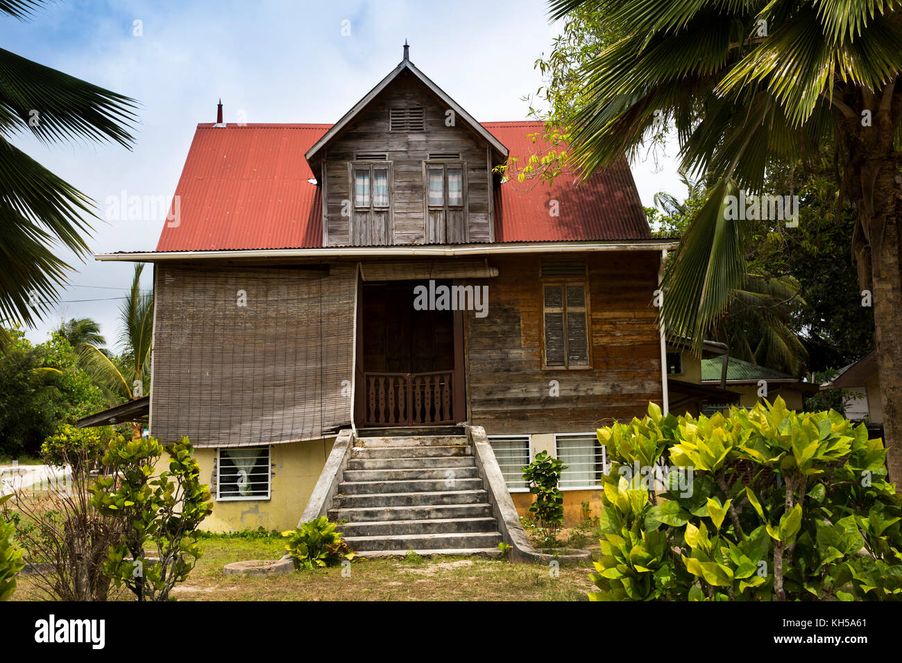 The Seychelles, La Digue, La Passe, old wooden house with dormer ...