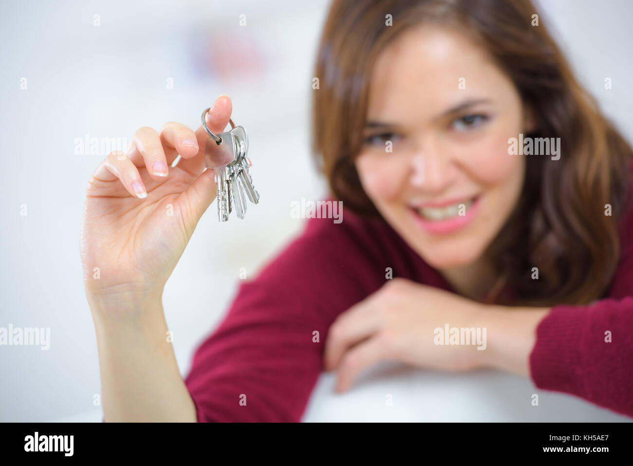 young woman holding the keys Stock Photo - Alamy