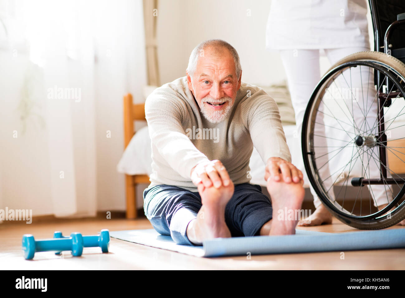 Health visitor and senior man during home visit Stock Photo - Alamy