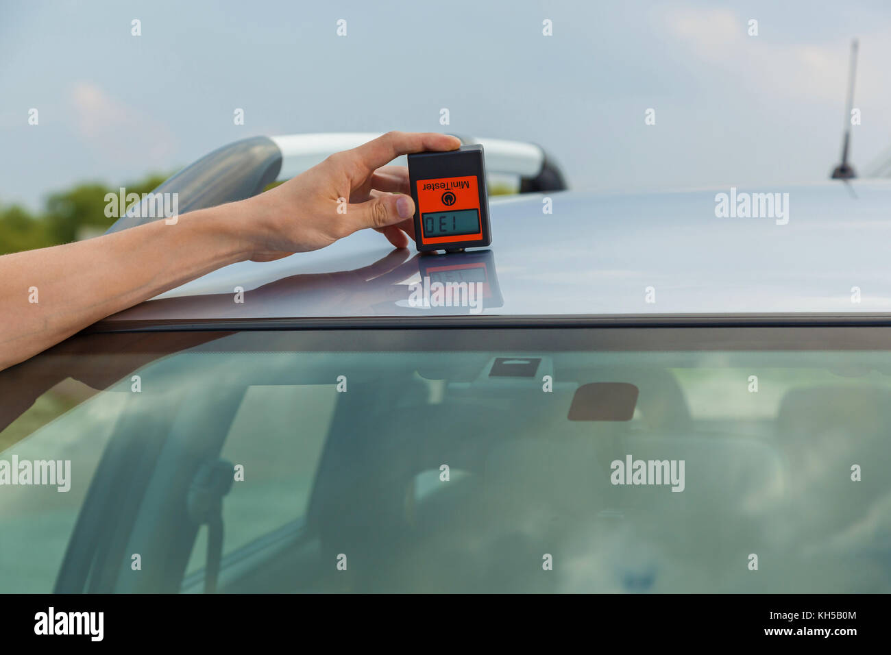 car body check.Instrument check paint thickness by car Stock Photo - Alamy