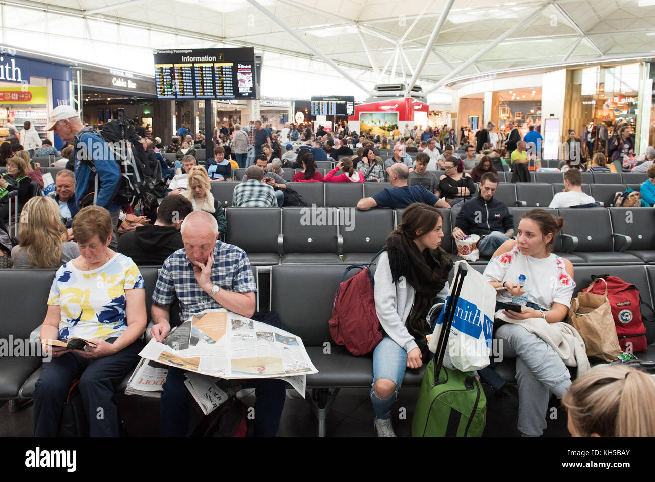 Delayed travellers waiting hi-res stock photography and images - Alamy