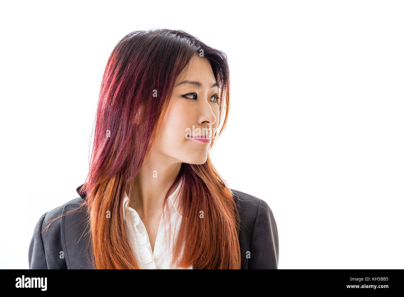 Portrait of Chinese female corporate executive, looking to side Stock ...