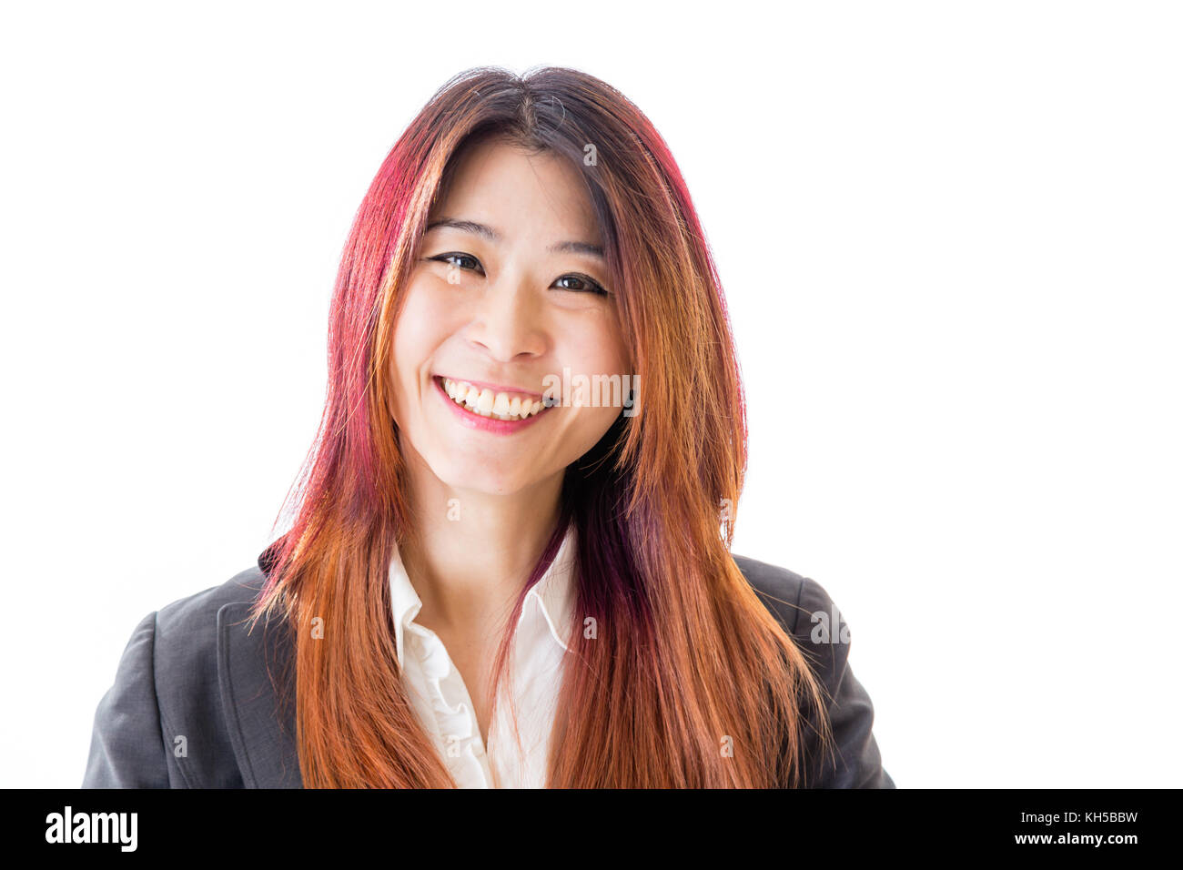 Portrait of smiling Chinese female executive looking at camera Stock ...
