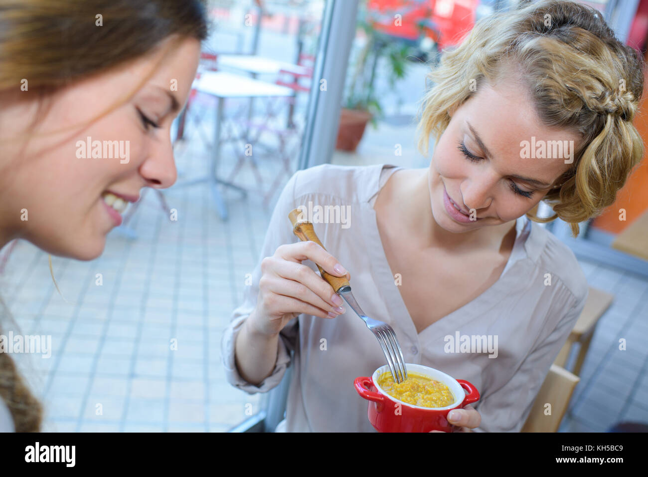 eating dessert with friend Stock Photo - Alamy