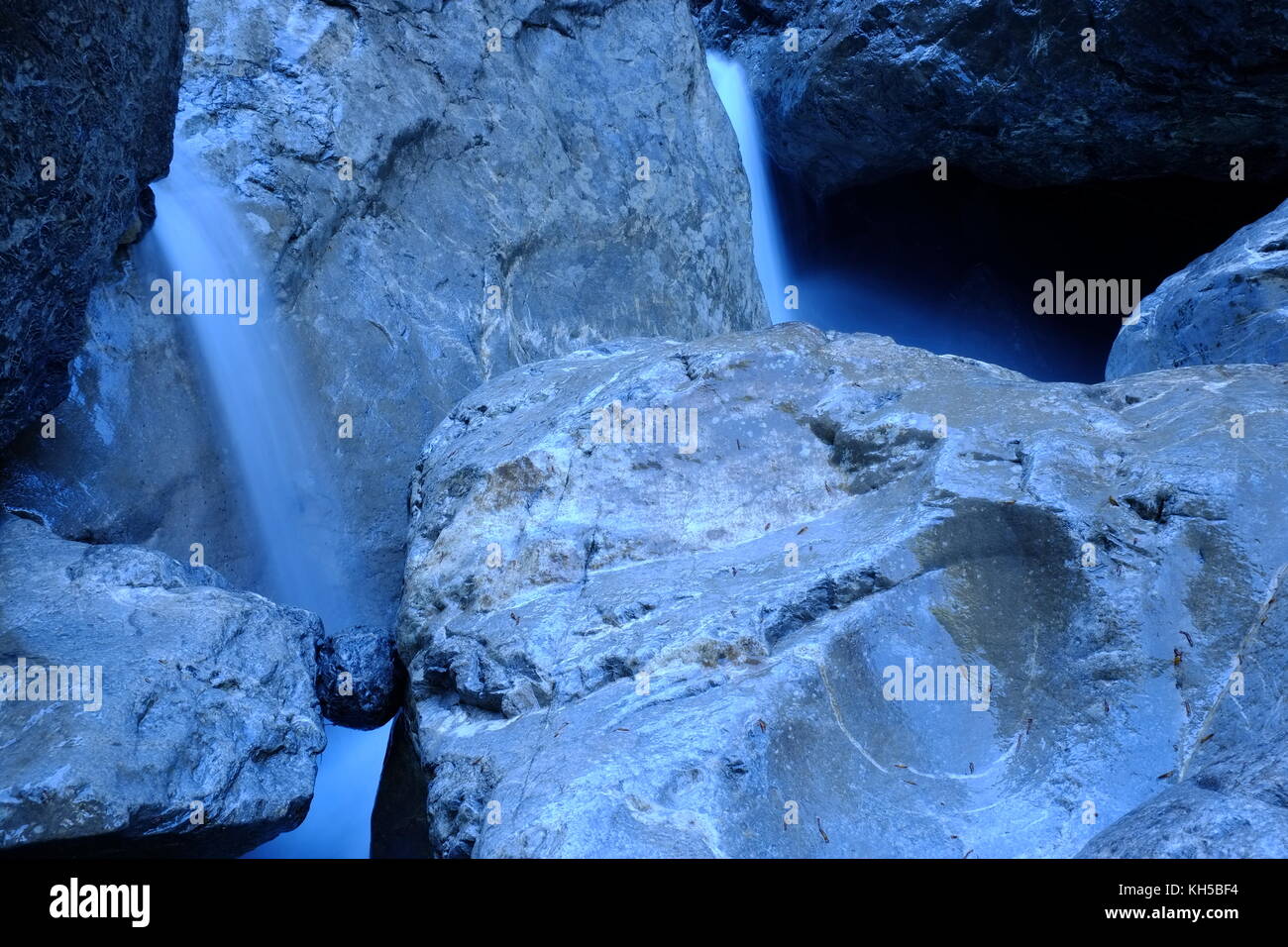 Ball of rock and small waterfalls Stock Photo - Alamy