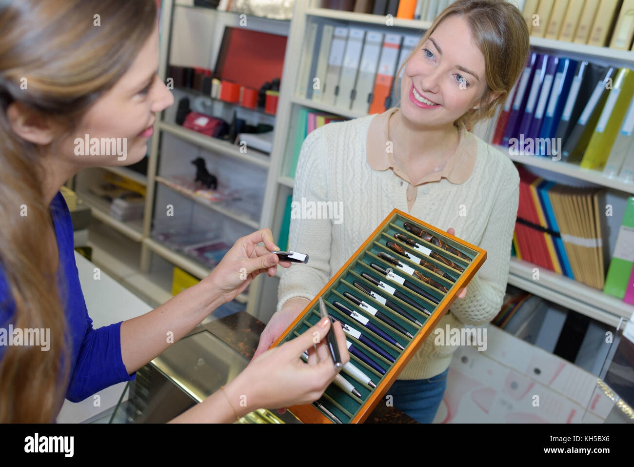 choosing pen from variety of marker pens at books store Stock Photo - Alamy