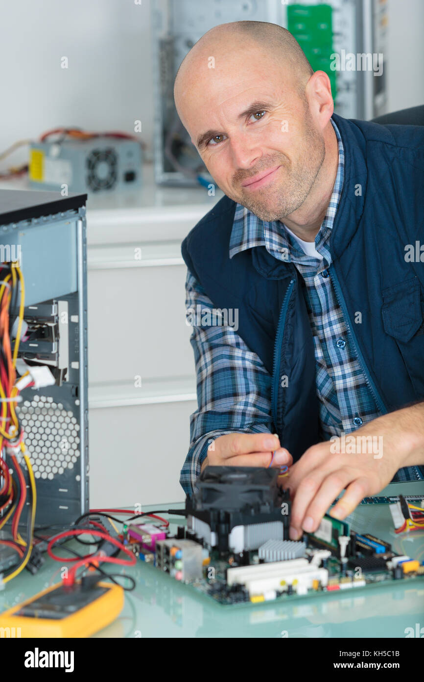 electronic repair fixing computer Stock Photo - Alamy