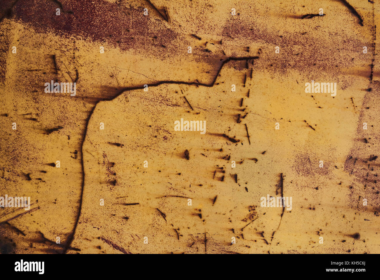 Rusty yellow painted metal wall. Rusty metal background with strips of ...