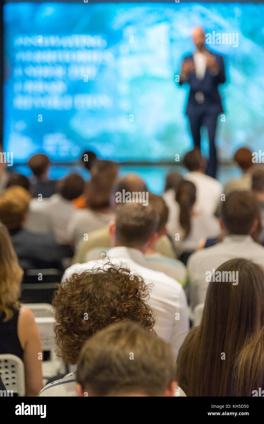 Audience listens to the lecturer Stock Photo - Alamy