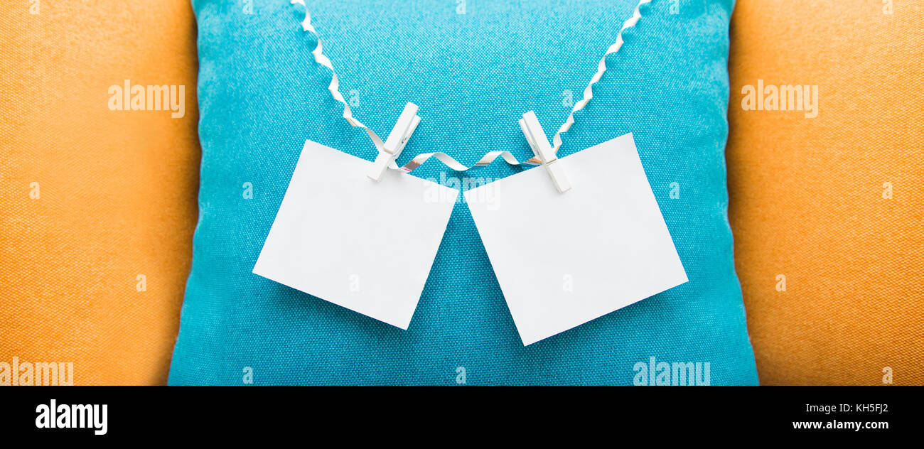 Mock up, hanging on a string with clothespins Stock Photo - Alamy