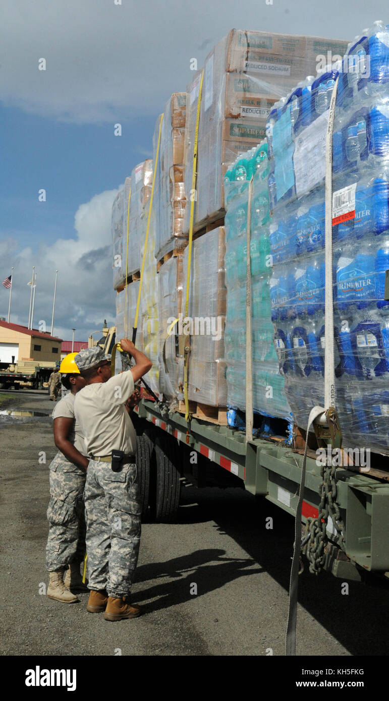 U.S. Virgin Islands National Guard Soldiers load up supplies at the ...