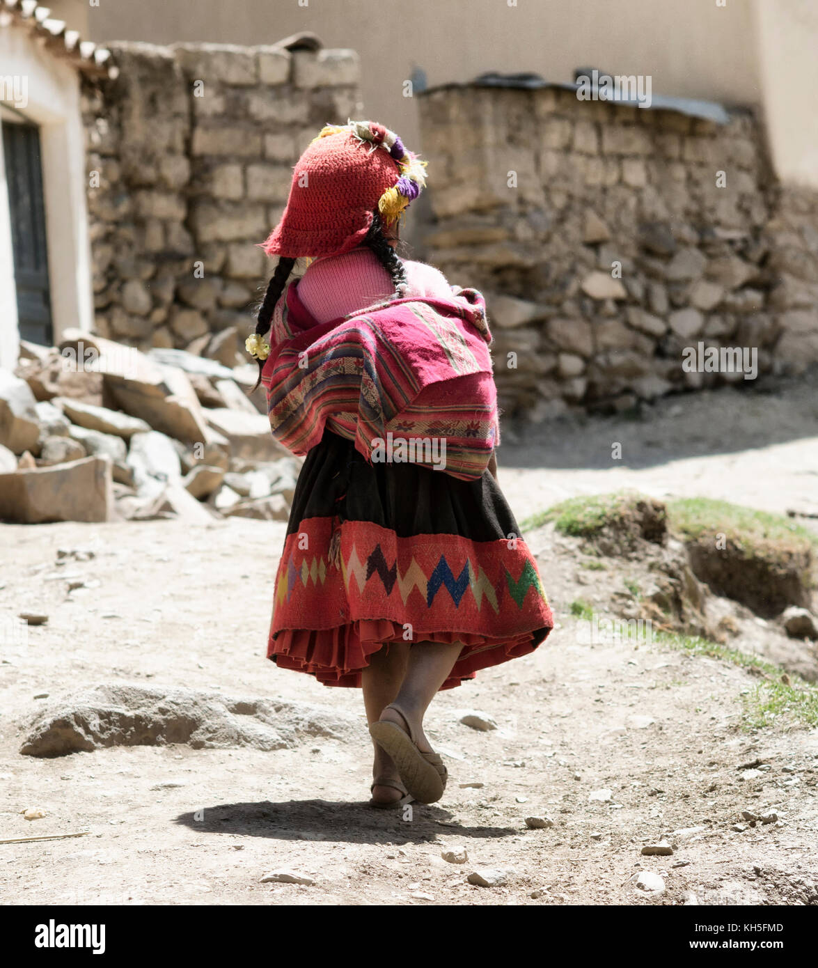 Peruvian girl dressed in colourful traditional handmade outfit. October ...